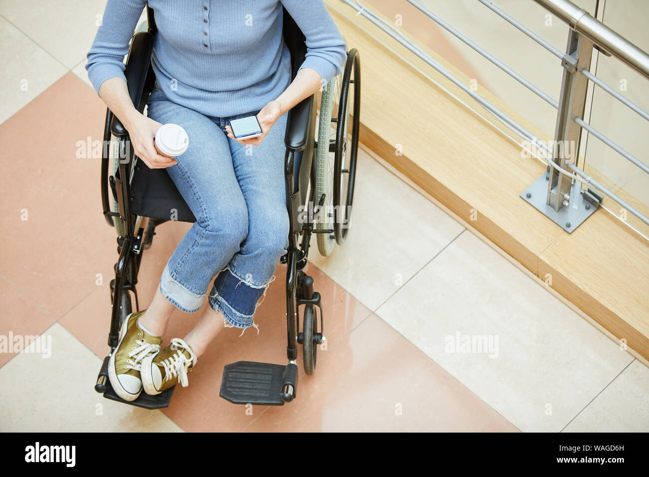 Woman one leg up on chair hi-res stock photography and images - Alamy