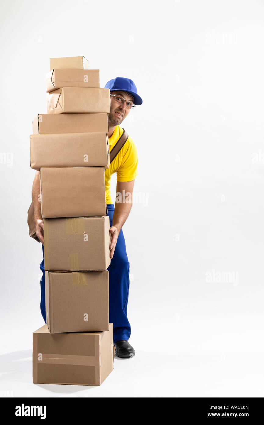 Brazilian mailman on a white background delivering a package. copy ...