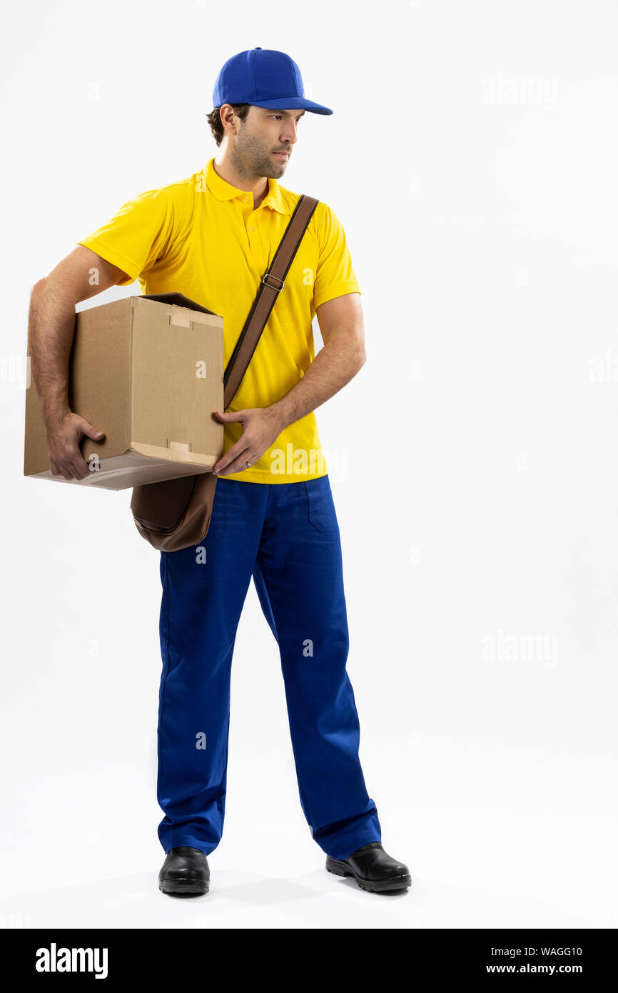 Brazilian mailman on a white background delivering a package. copy ...