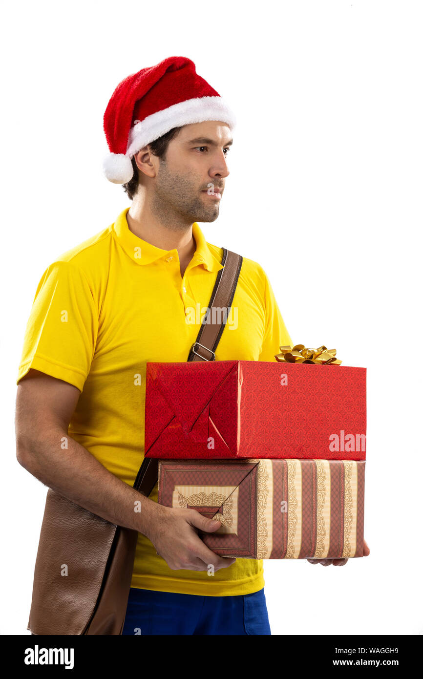 Brazilian mailman dressed as Santa Claus delivering a gift on a white ...