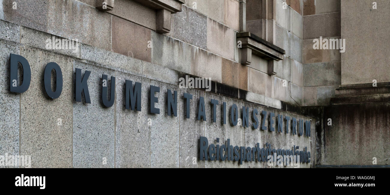 Low angle view of text on wall Stock Photo - Alamy