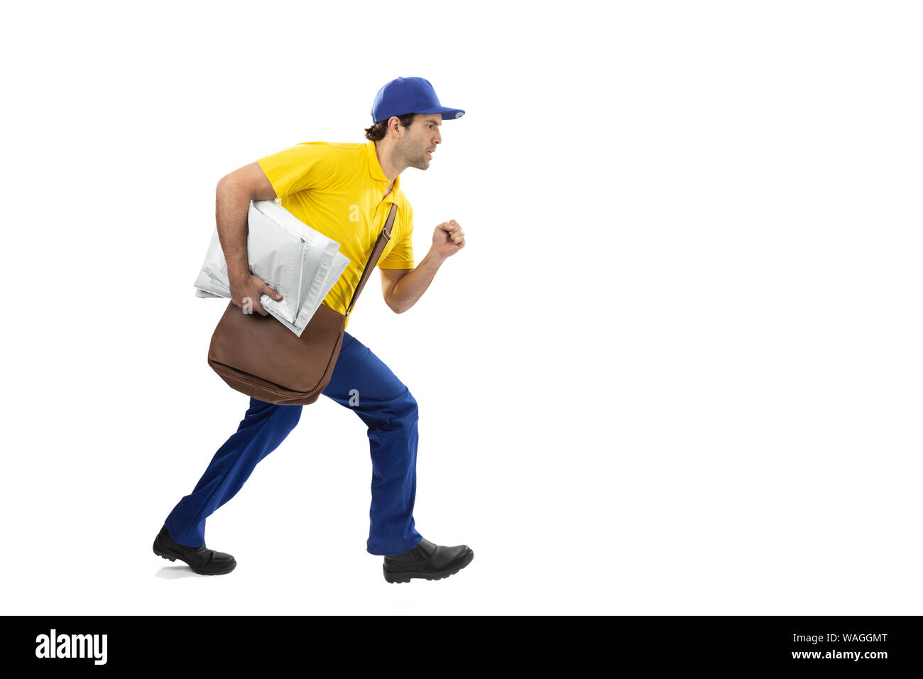 Brazilian mailman running with a package on a white background. copy ...