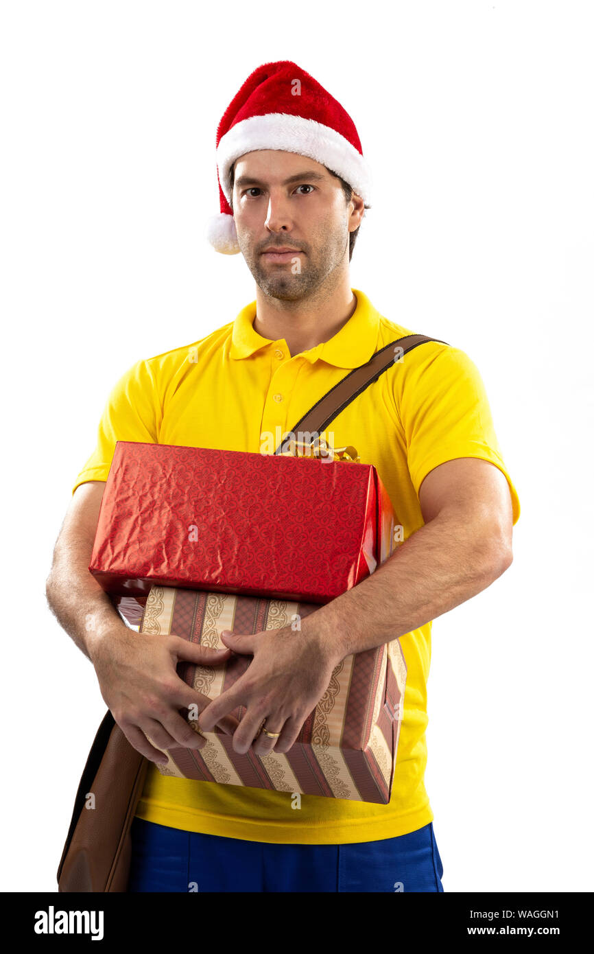 Brazilian mailman dressed as Santa Claus delivering a gift on a white ...