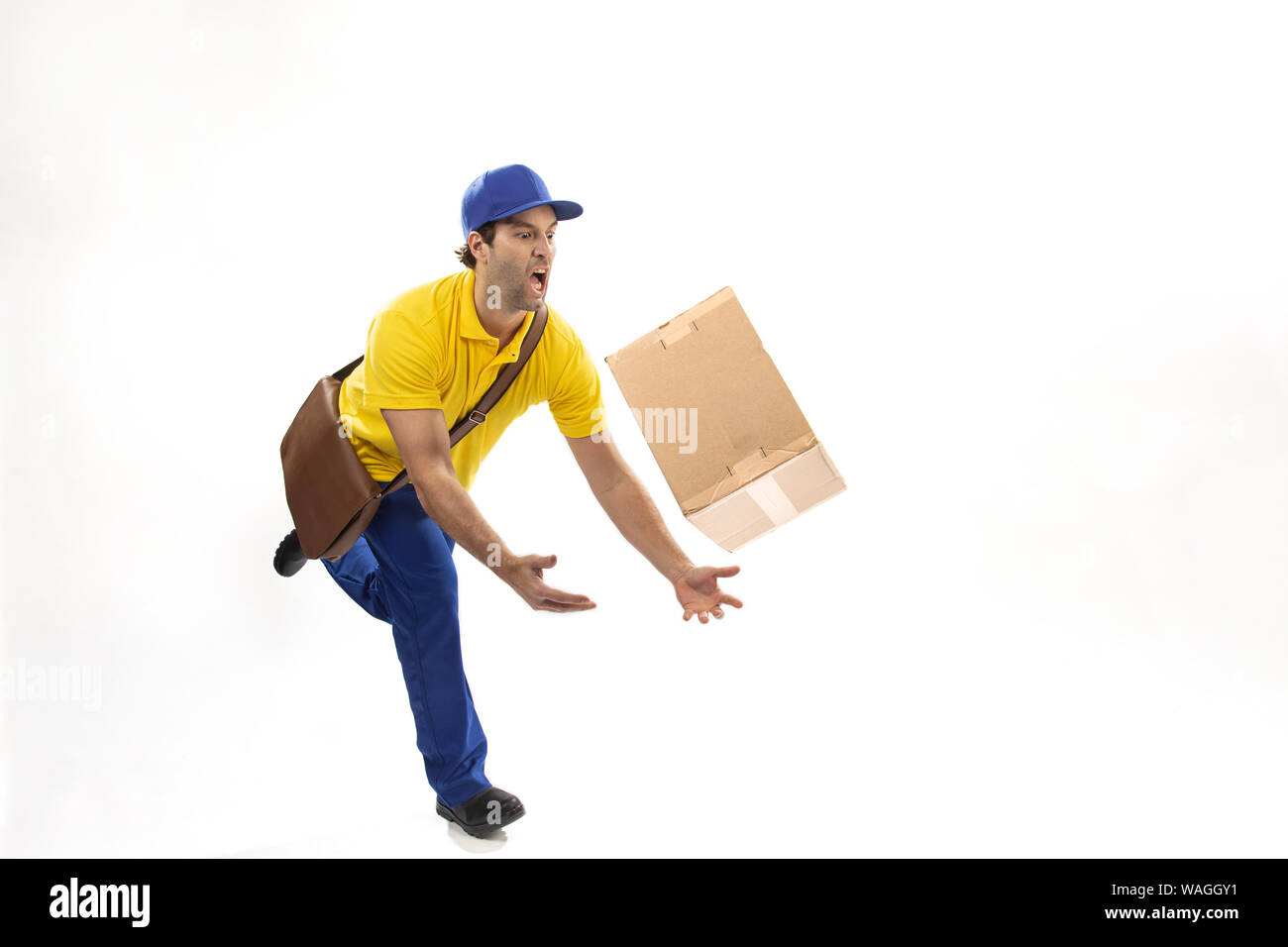 Brazilian mailman dropping a package on a white background. copy space ...