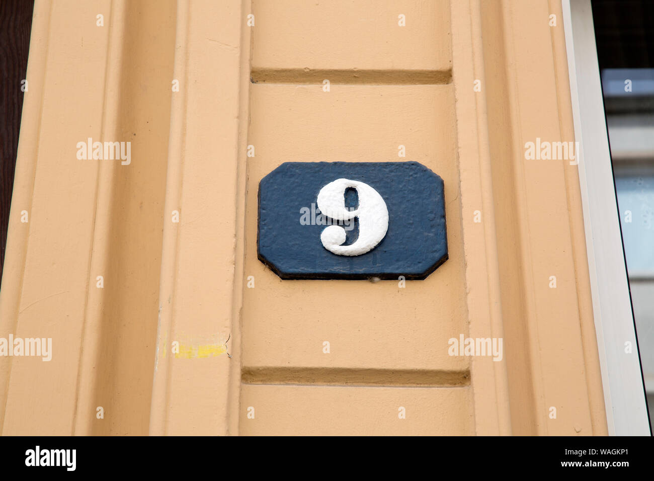 House number 9 sign on wall hi-res stock photography and images - Alamy