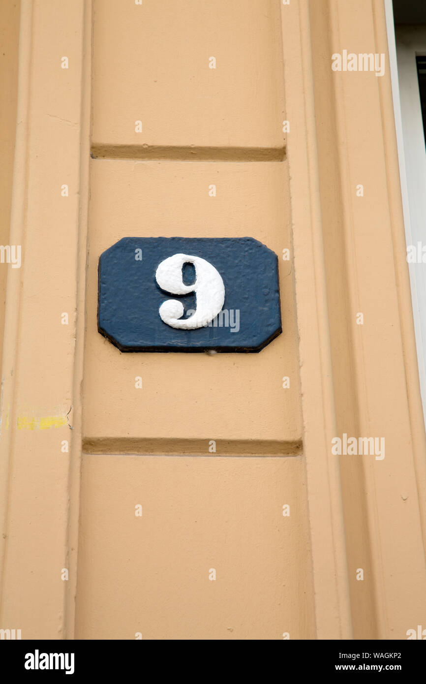 House number 9 sign on wall hi-res stock photography and images - Alamy