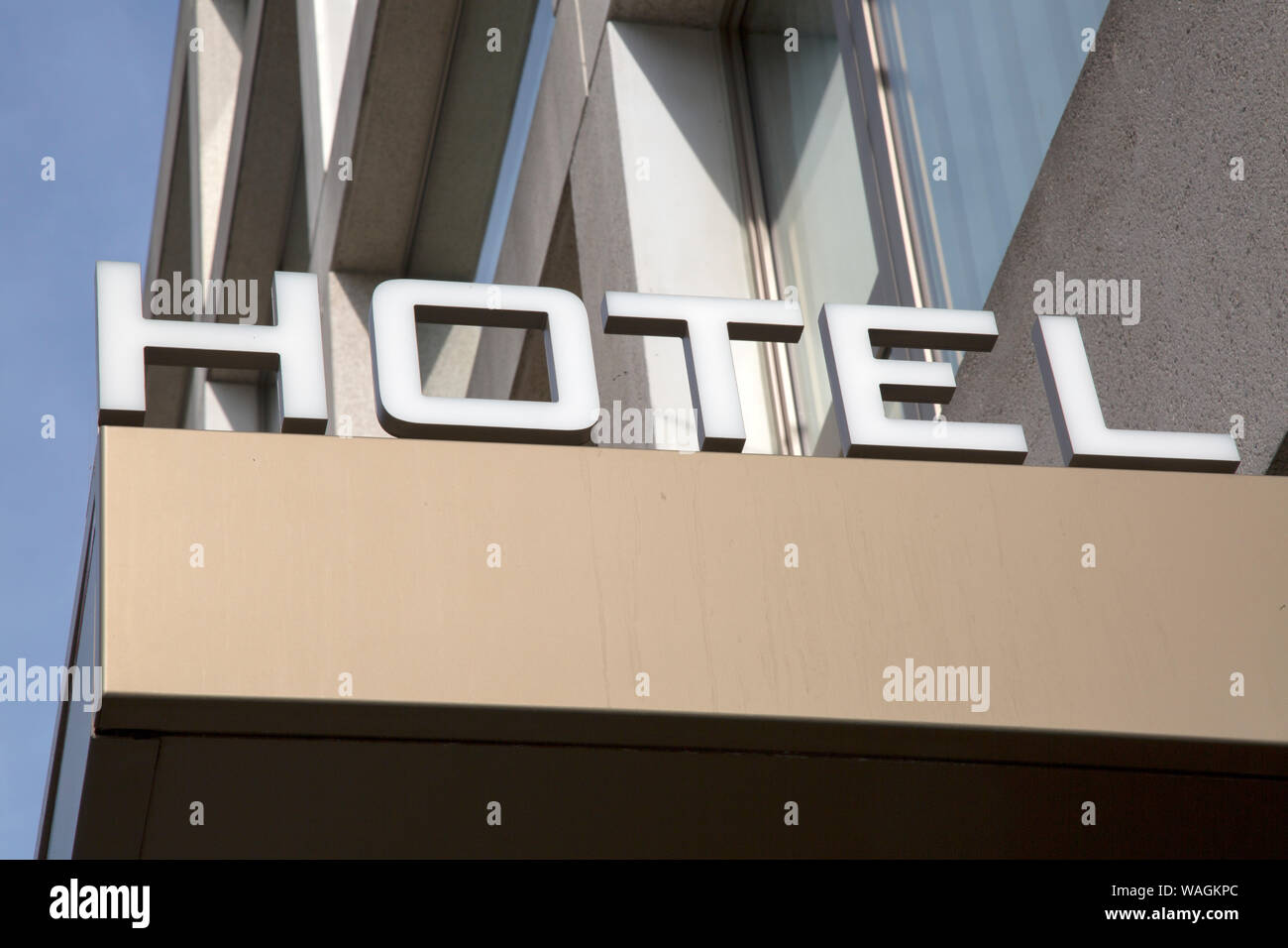 Hotel Sign on Building Facade Stock Photo - Alamy