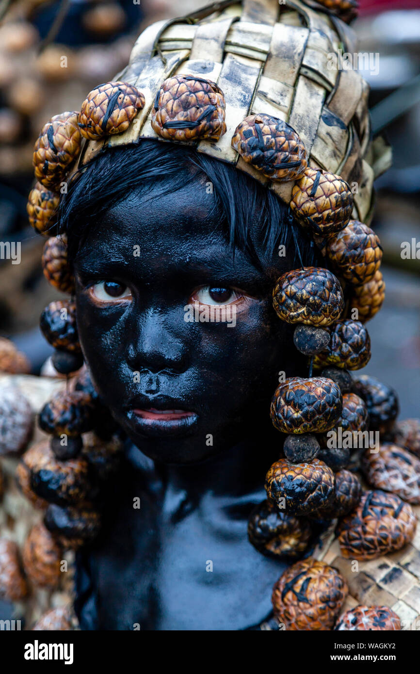 A Filipino Child Takes Part In A Children’s Parade During The Ati ...