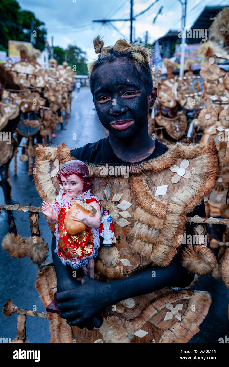 People Dressed In Tribal Costume Parade Through The Streets Of Kalibo ...