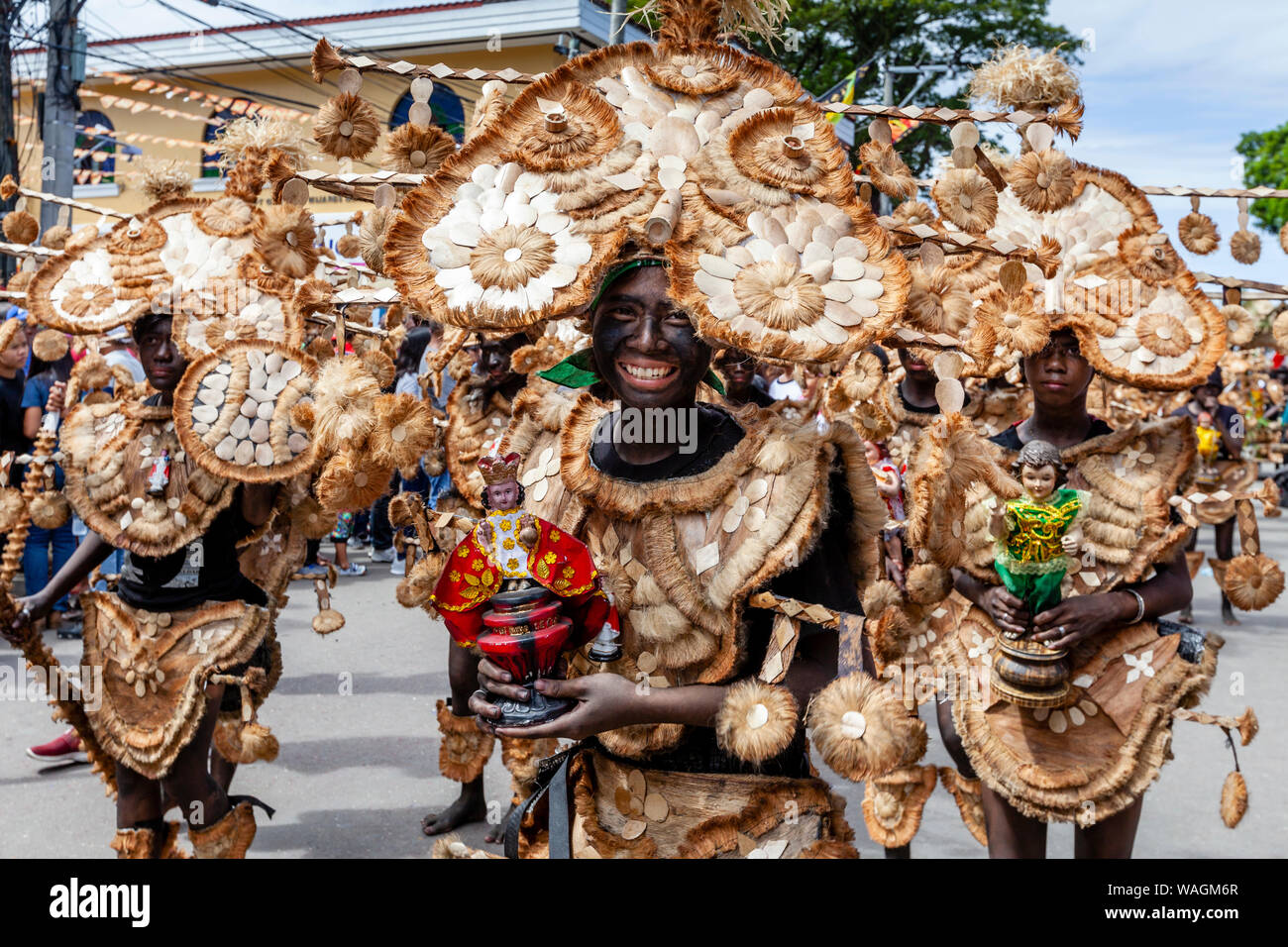 Children Dressed In Tribal Costume Parade Through The Streets Holding ...