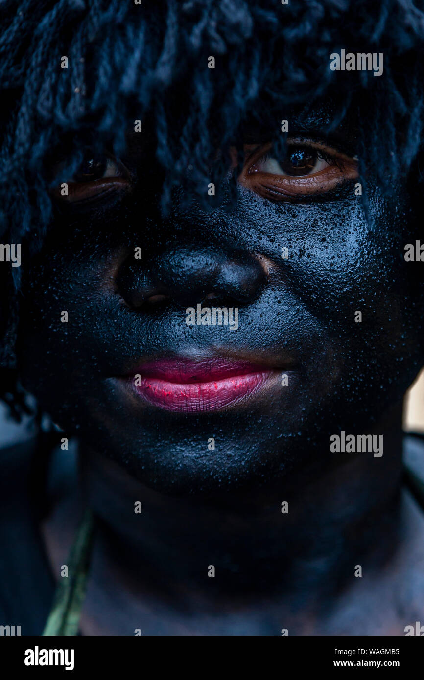 A Young Filipino Man Dressed In Tribal Costume Takes Part In The Annual ...