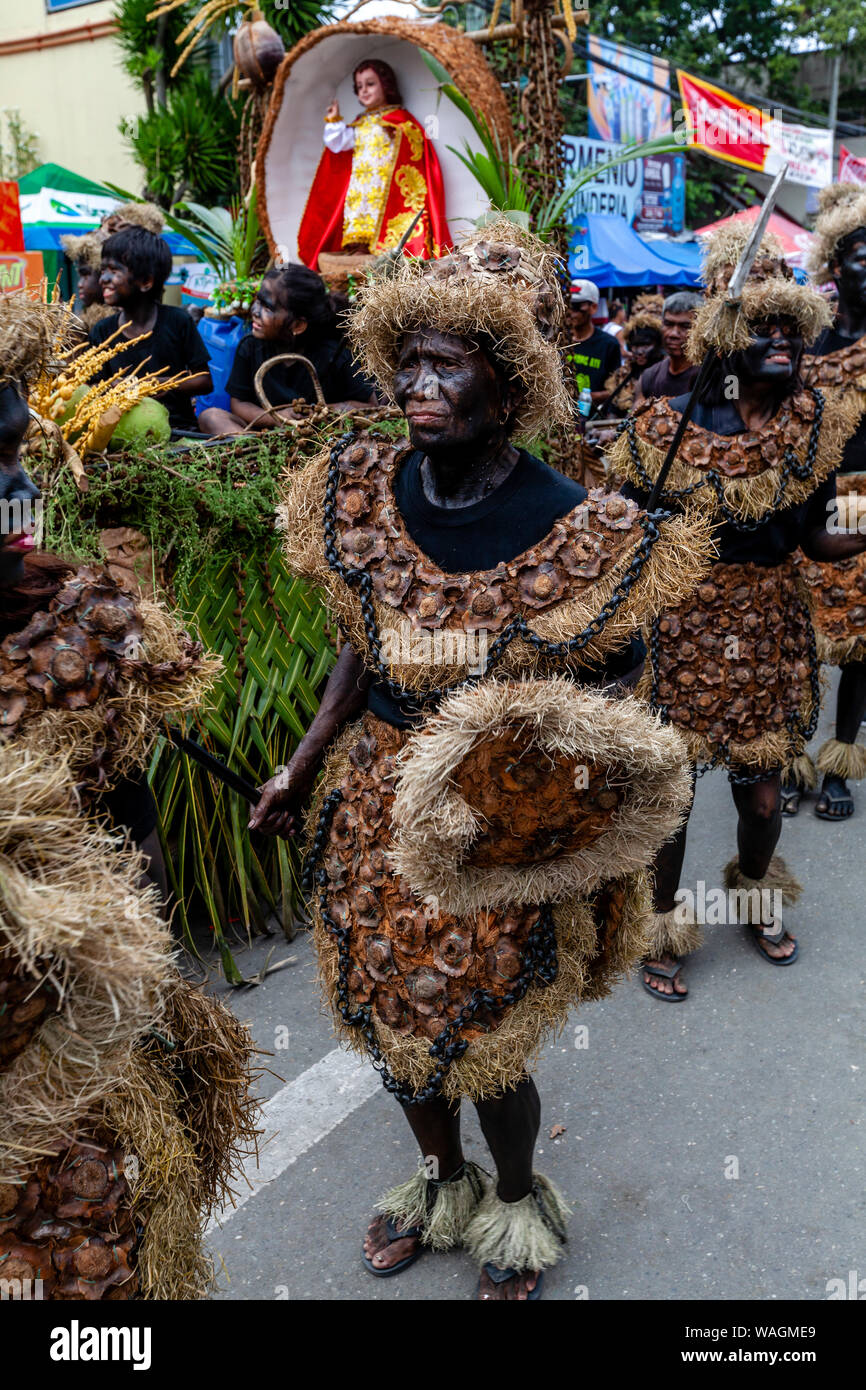 Local People Take Part In A Tribal Procession During The Ati-Atihan ...
