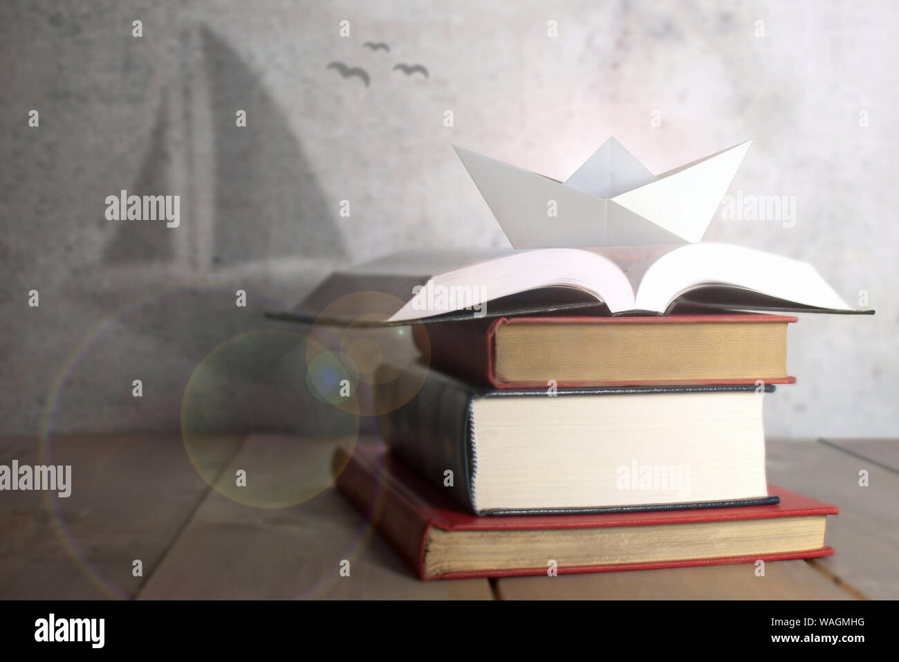 Paper boat open book hi-res stock photography and images - Alamy
