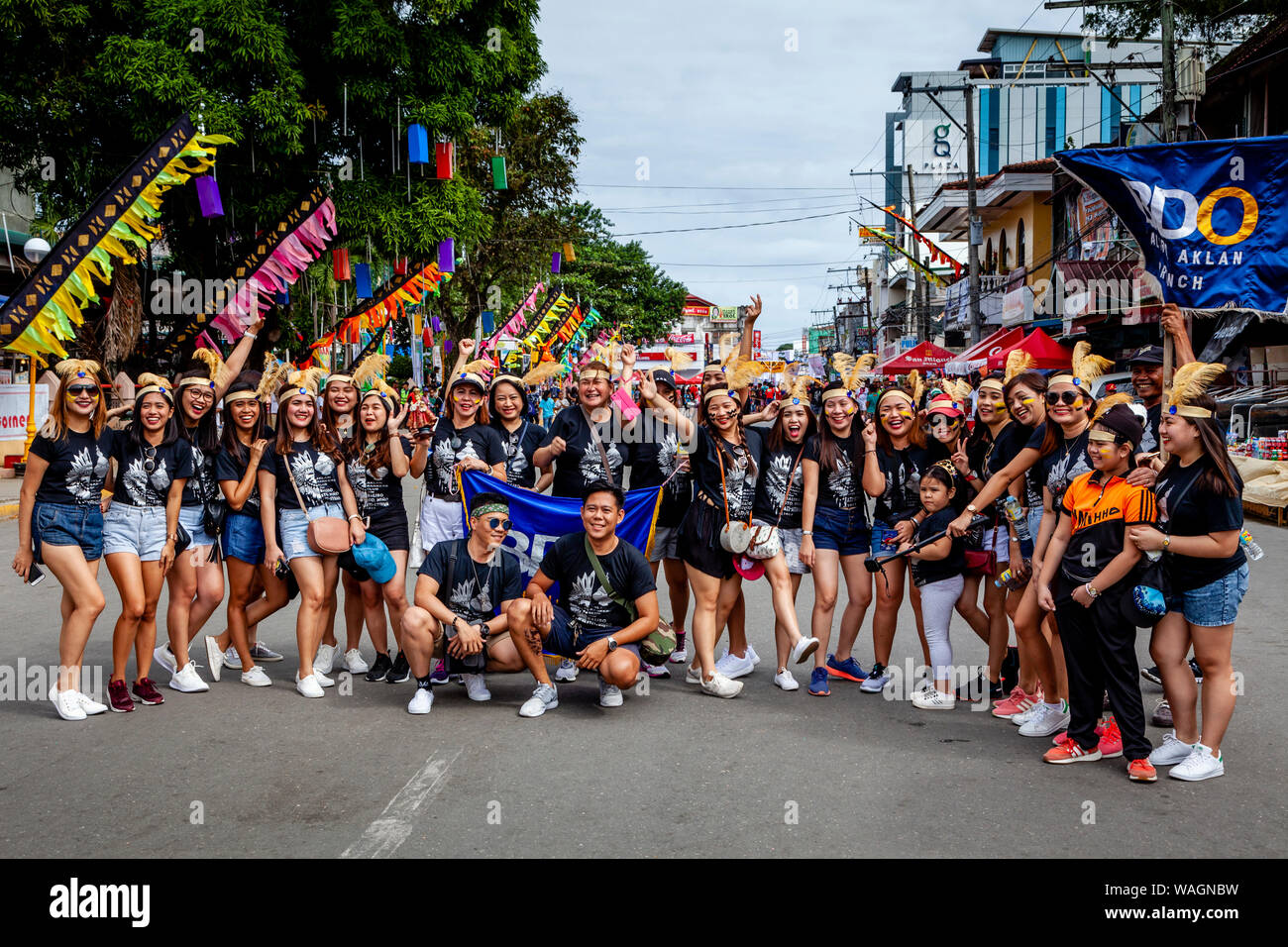 Local People In Colourful Costumes Parade Through The Streets Of Kalibo ...