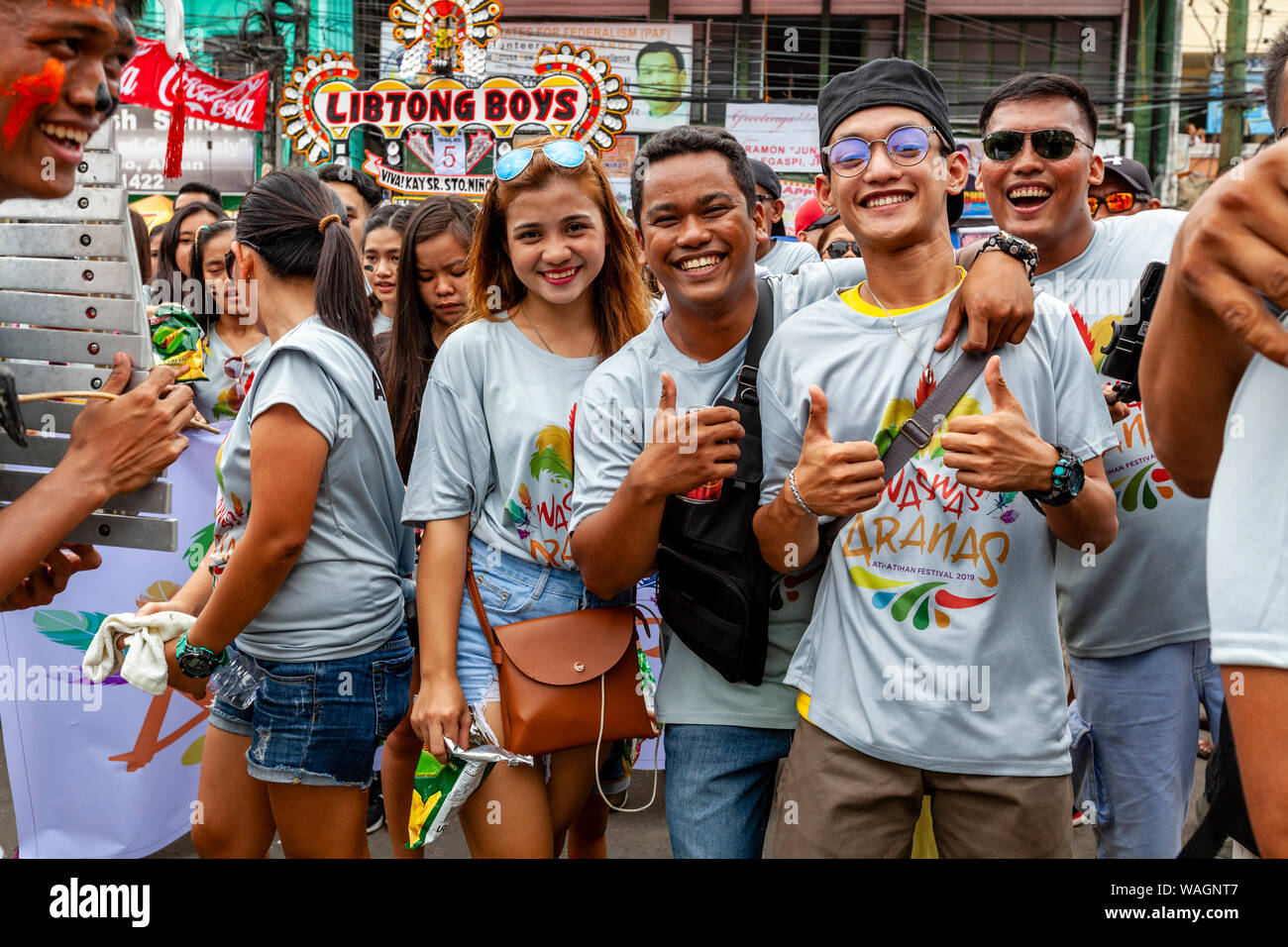Young Filipinos Take Part In A Street Parade During The Ati-Atihan ...