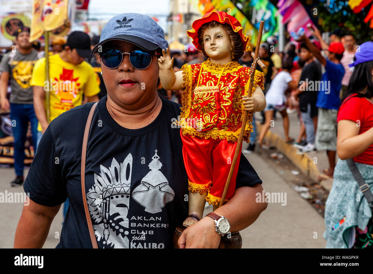 Local People Parade Their Santo Nino Statues Around The Streets Of ...