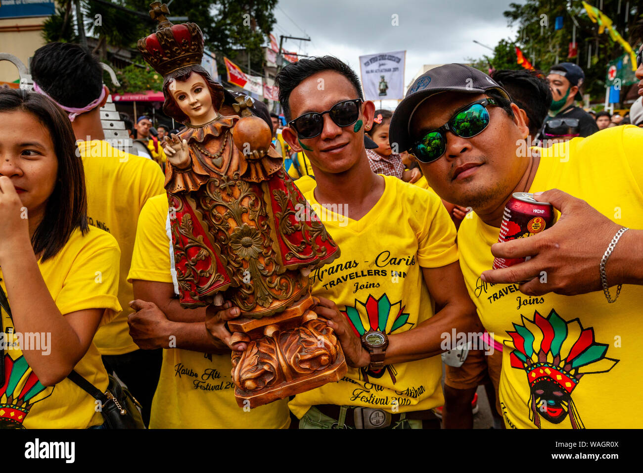 Local People Parade Their Santo Nino Statues Around The Streets Of ...