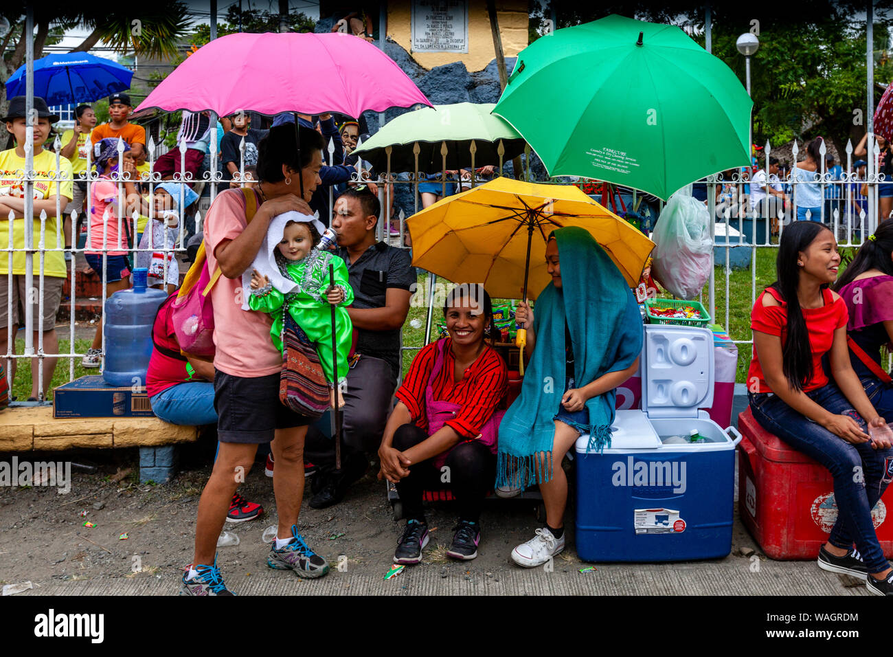 Local People Selling Cold Drinks In The Rain During The Ati-Atihan ...