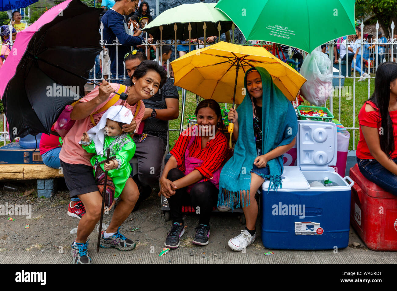Local People Selling Cold Drinks In The Rain During The Ati-Atihan ...
