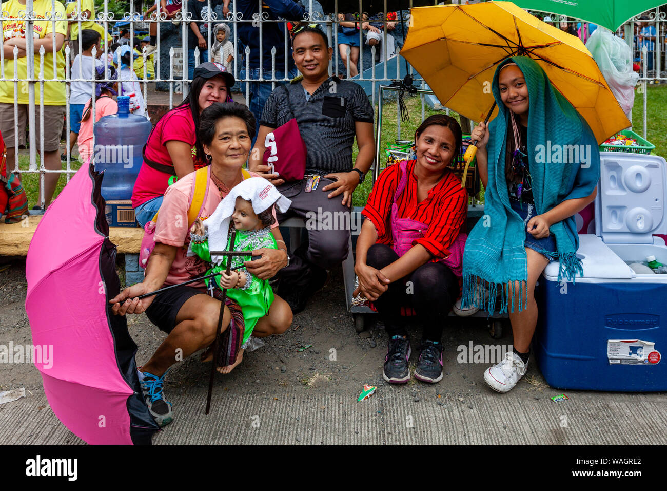 Local People Selling Cold Drinks In The Rain During The Ati-Atihan ...