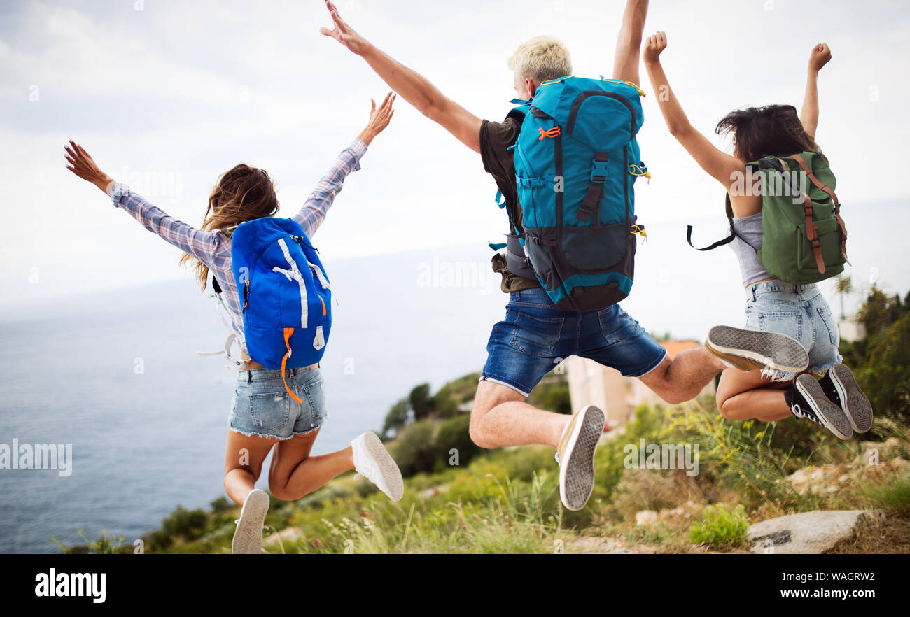 Group of friends traveling together and having fun Stock Photo - Alamy