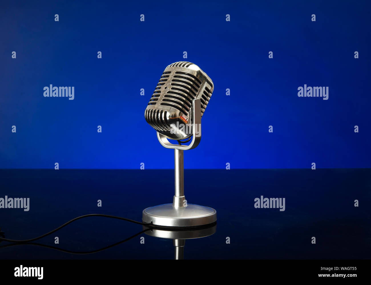 Retro vintage style metal microphone isolated, RJ, Singing listening ...