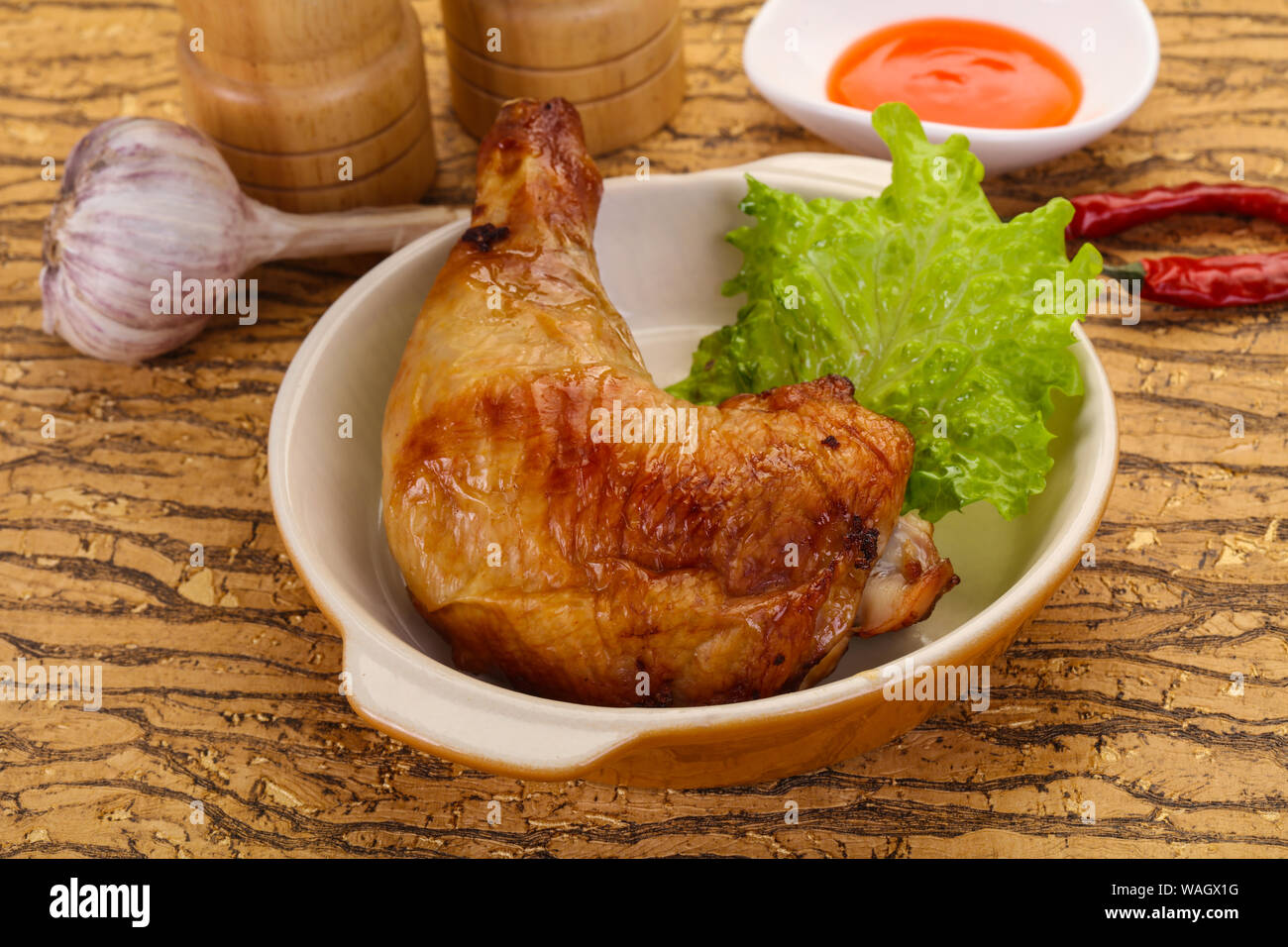 Crispy tasty Roasted chicken leg Stock Photo - Alamy