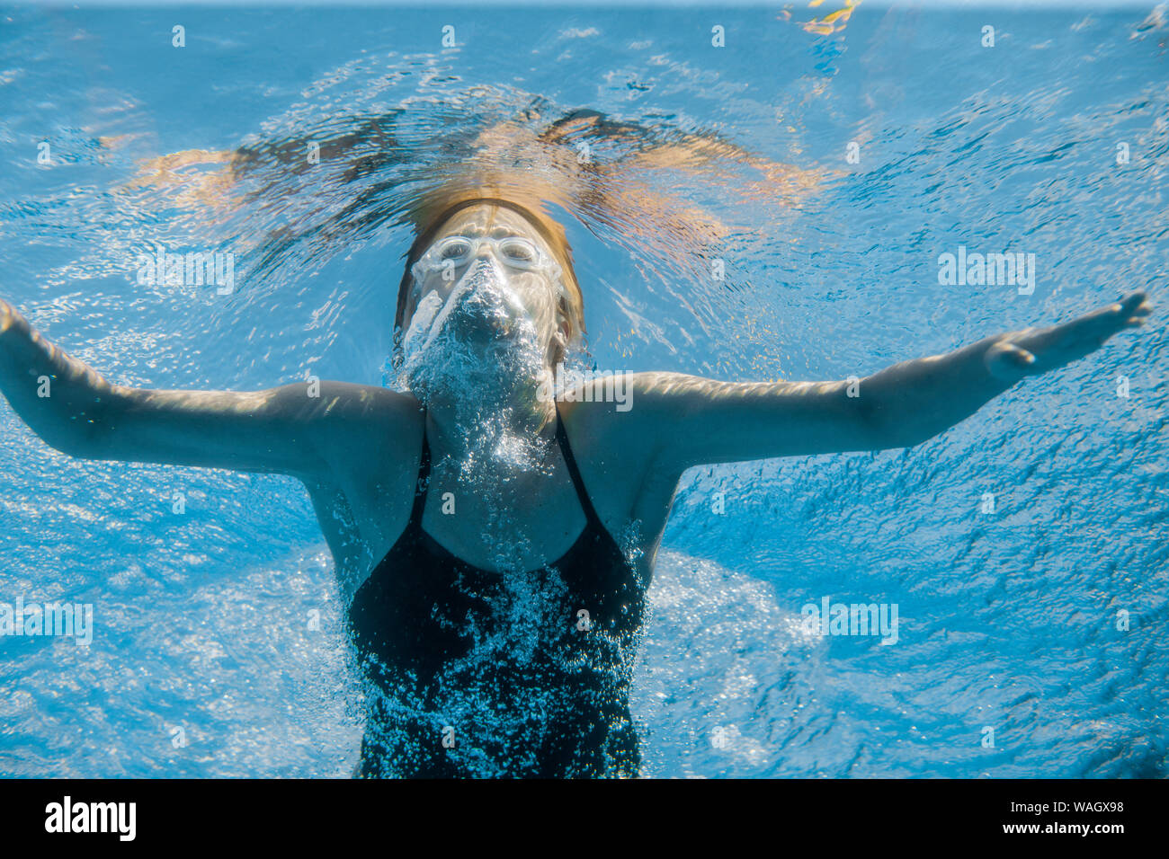 Female swimmer under the water Stock Photo - Alamy