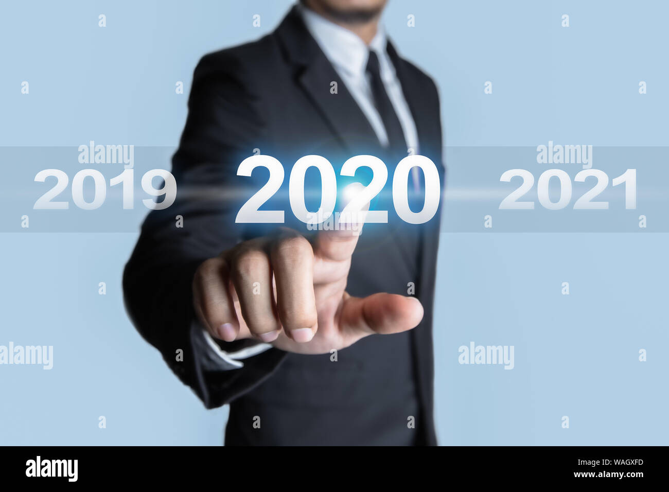 Businessmen are choose to touching the year 2020. Concept of targeting ...