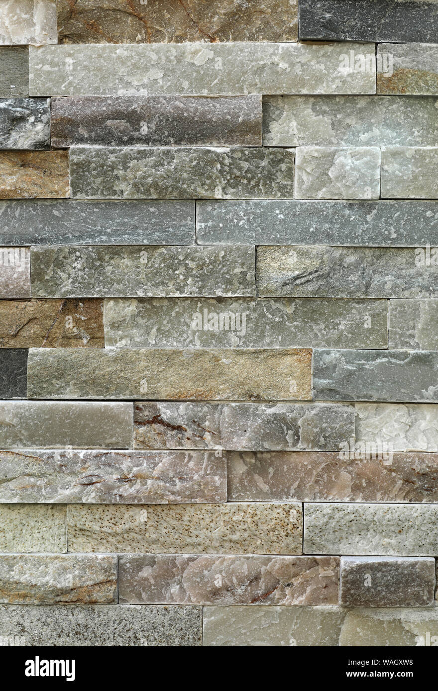 Stone wall made of small stones Stock Photo - Alamy