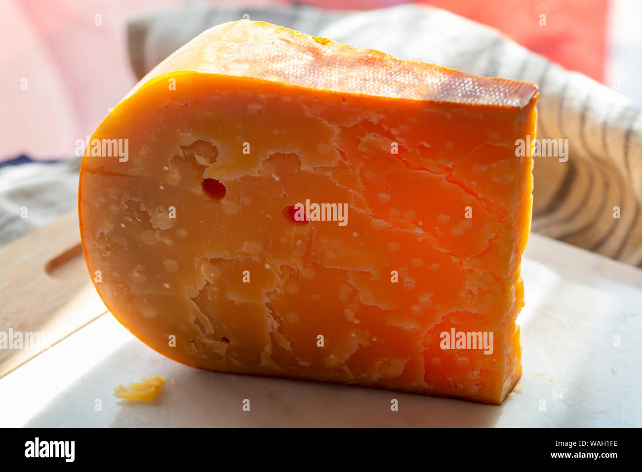 Cheese collection, one piece of three years old dark yellow hard Dutch ...