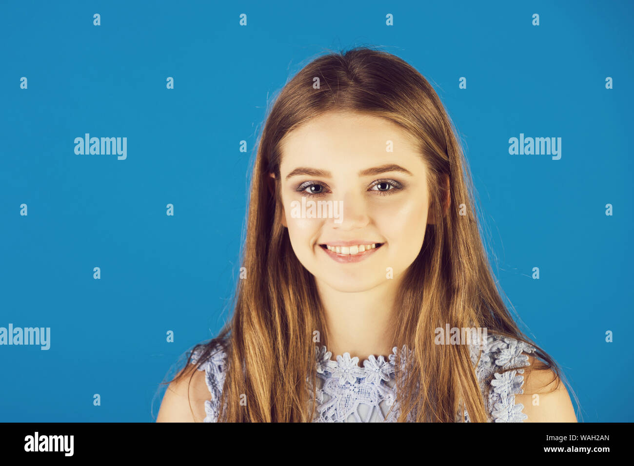 Woman with long hair and makeup Stock Photo - Alamy