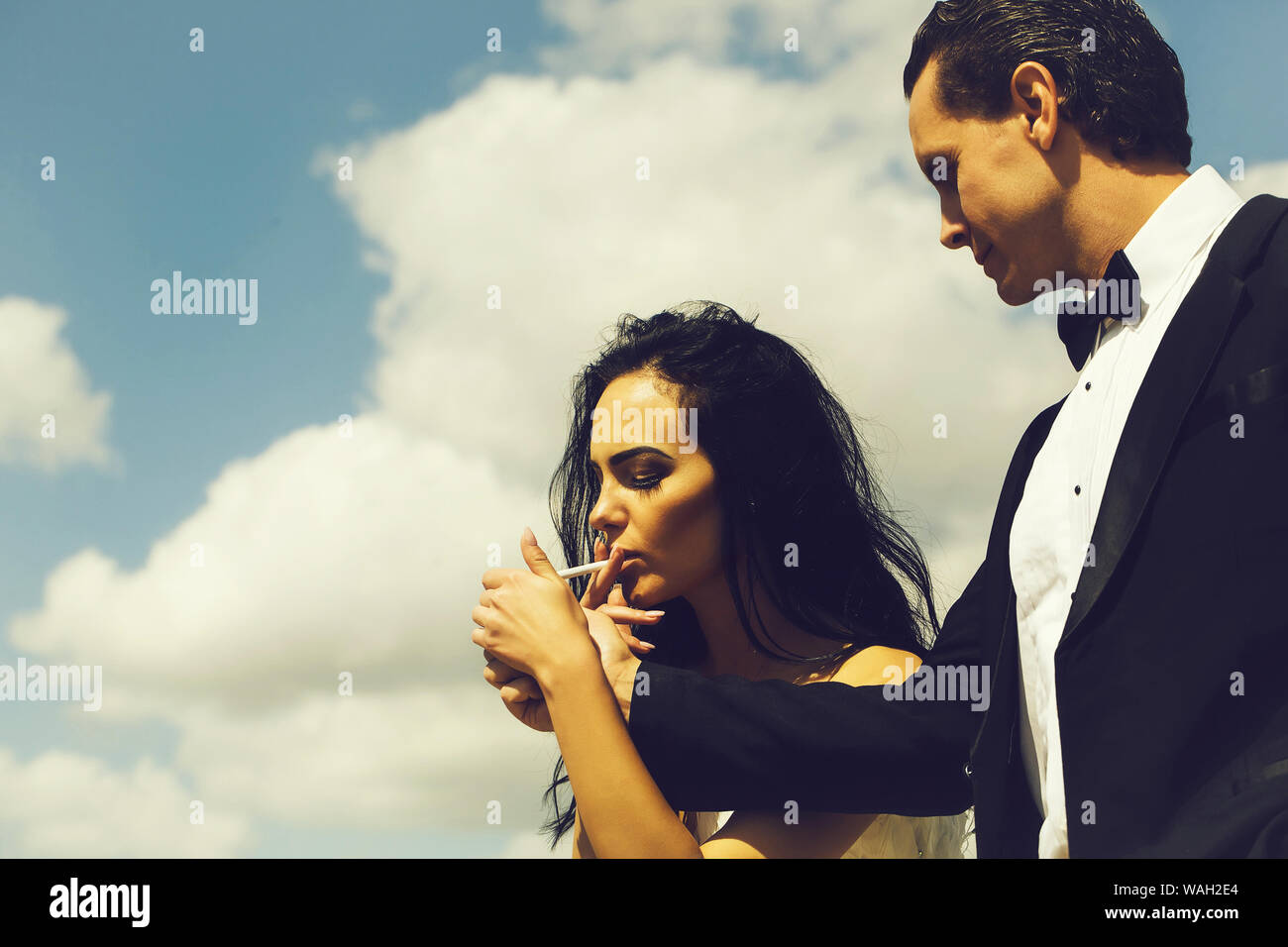 Beautiful woman smoking cigarette Stock Photo - Alamy