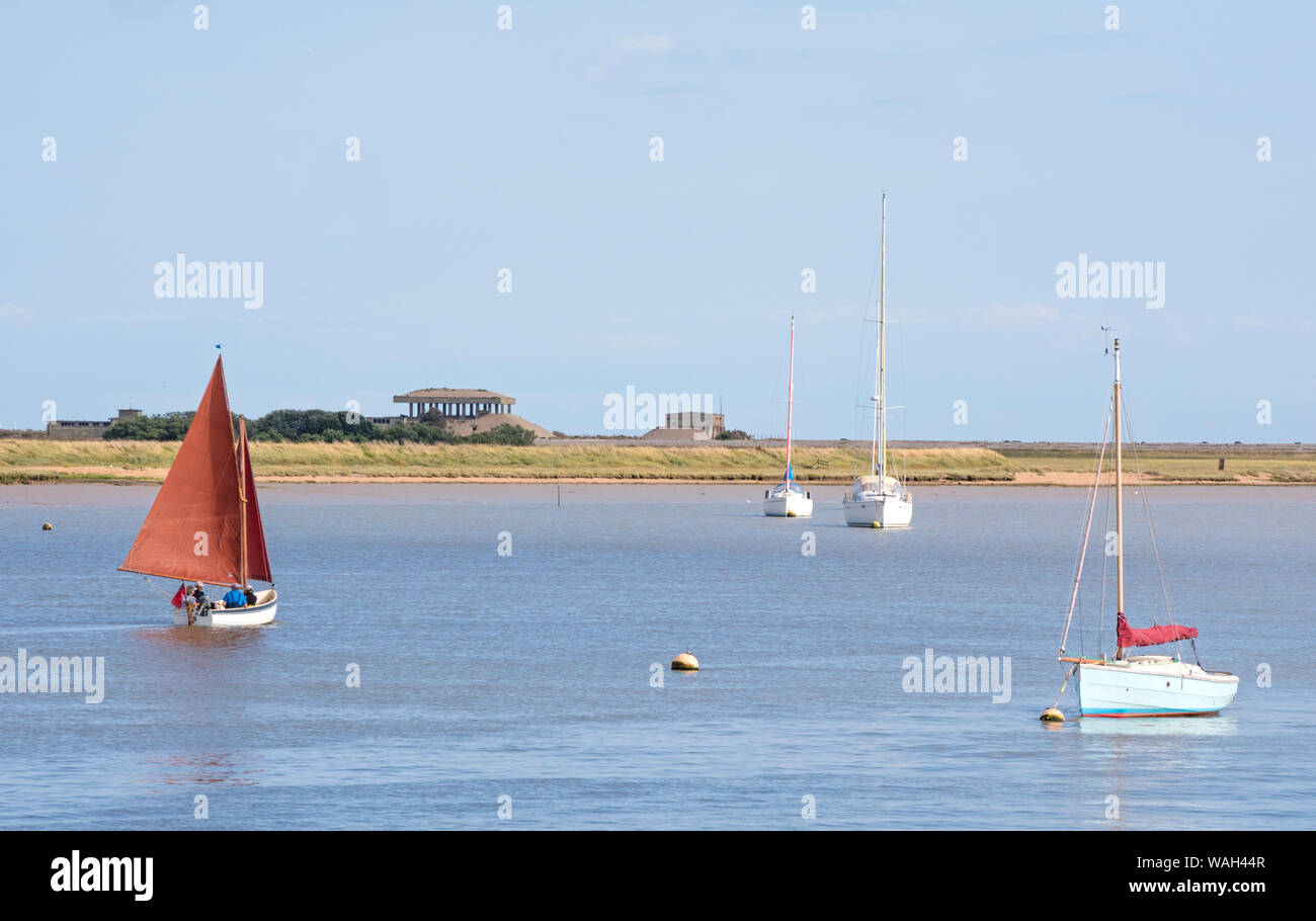 Boating on the River Ore at Orford looking across to Orfordness,nature ...