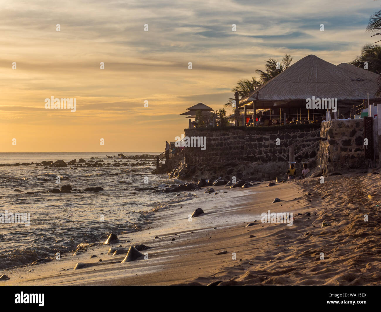 Sunset on the Atlantic coast in Dakar and the silhouette of a coastal ...