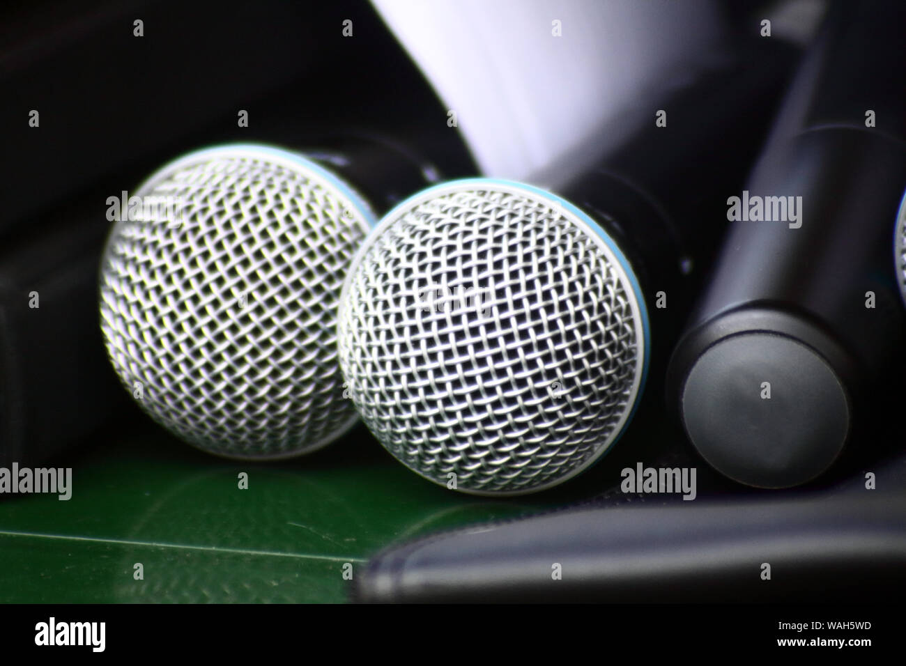 Microphones on conference table hi-res stock photography and images - Alamy