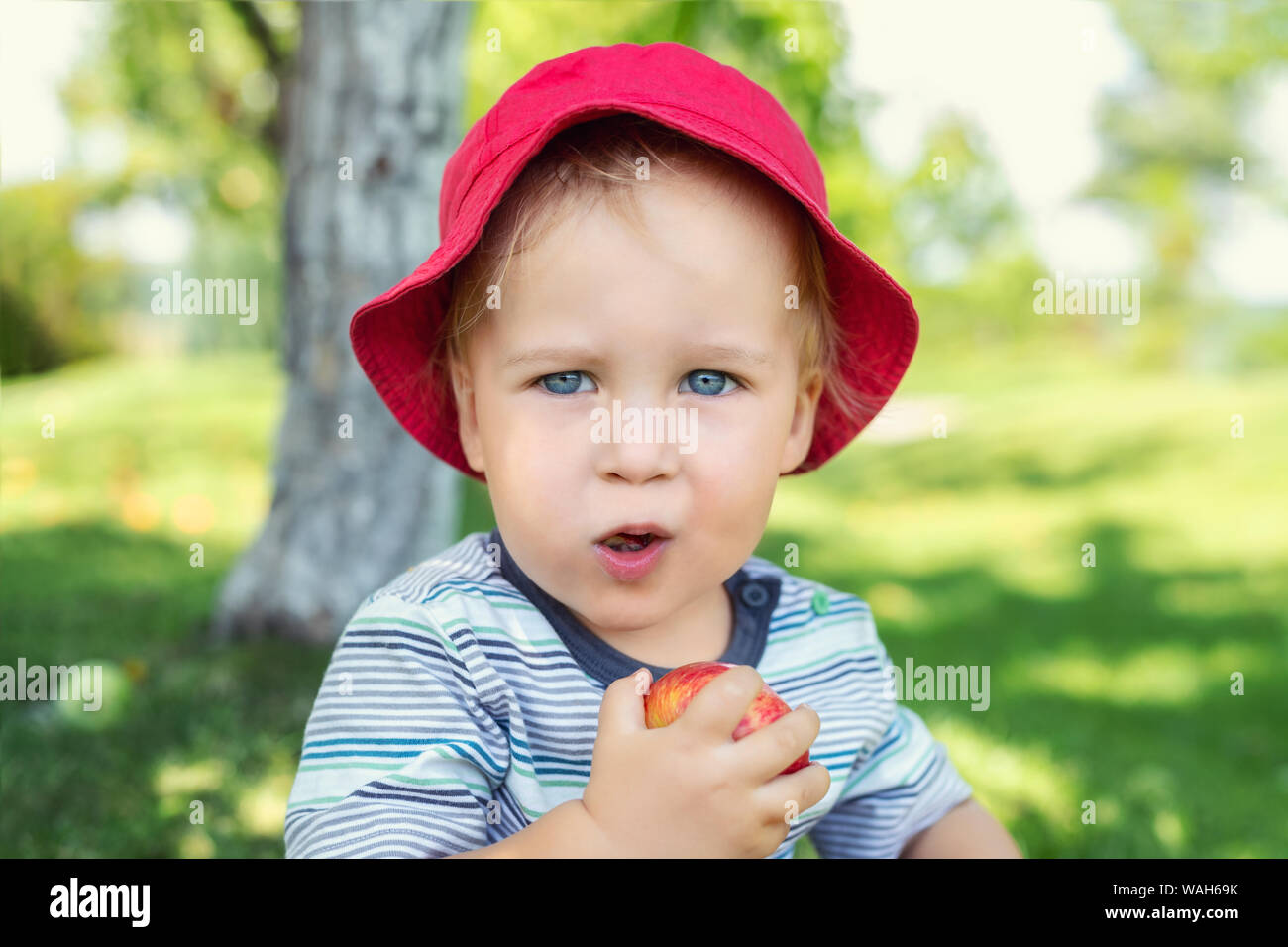 Funny little baby biting on hi-res stock photography and images - Alamy