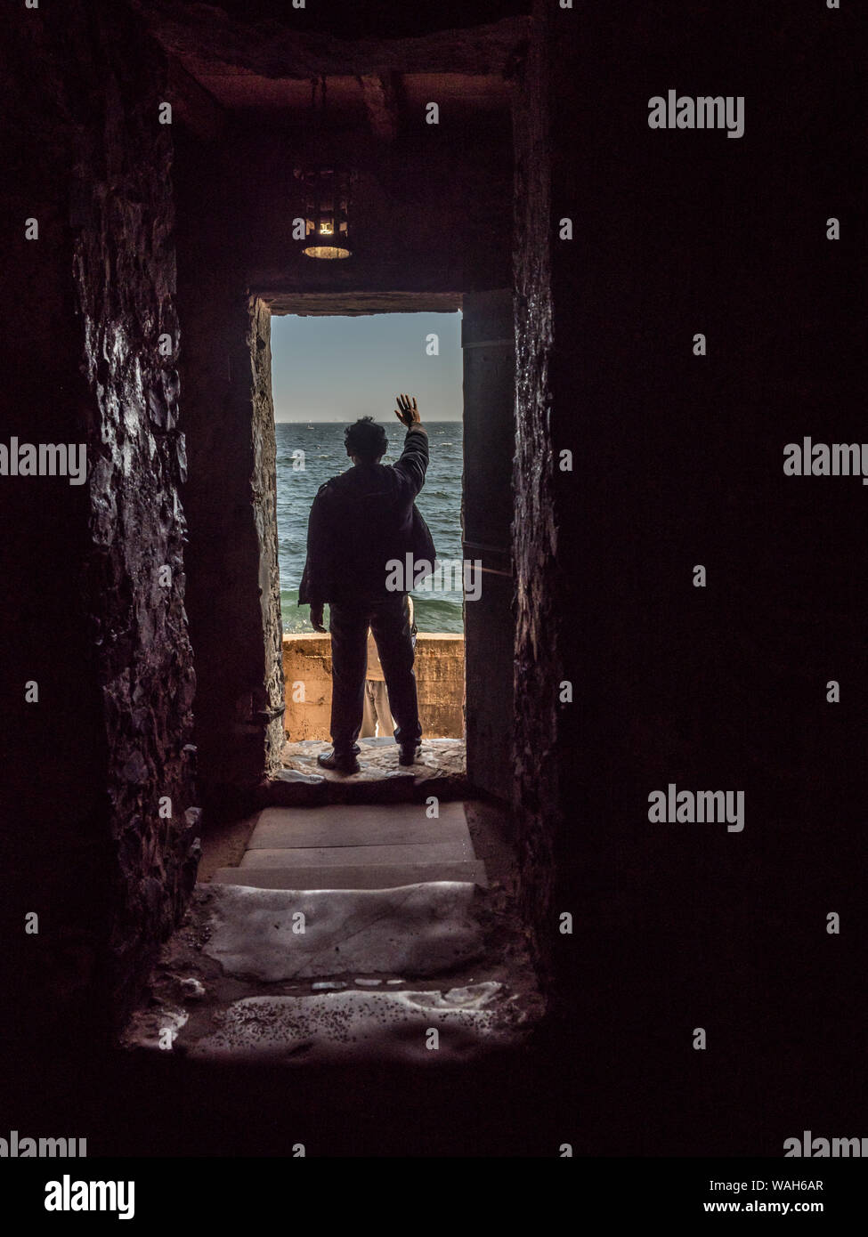 A Door with No return and the silhouette of a waving man in the House ...