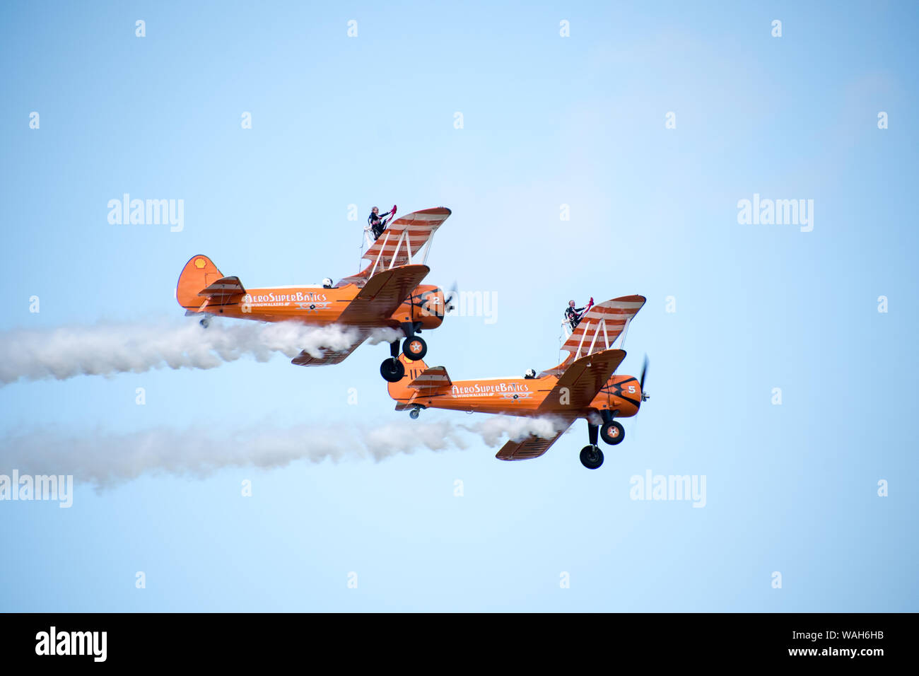 Aerobatic Formation Wing walking display by Aerosuperbatics team ...