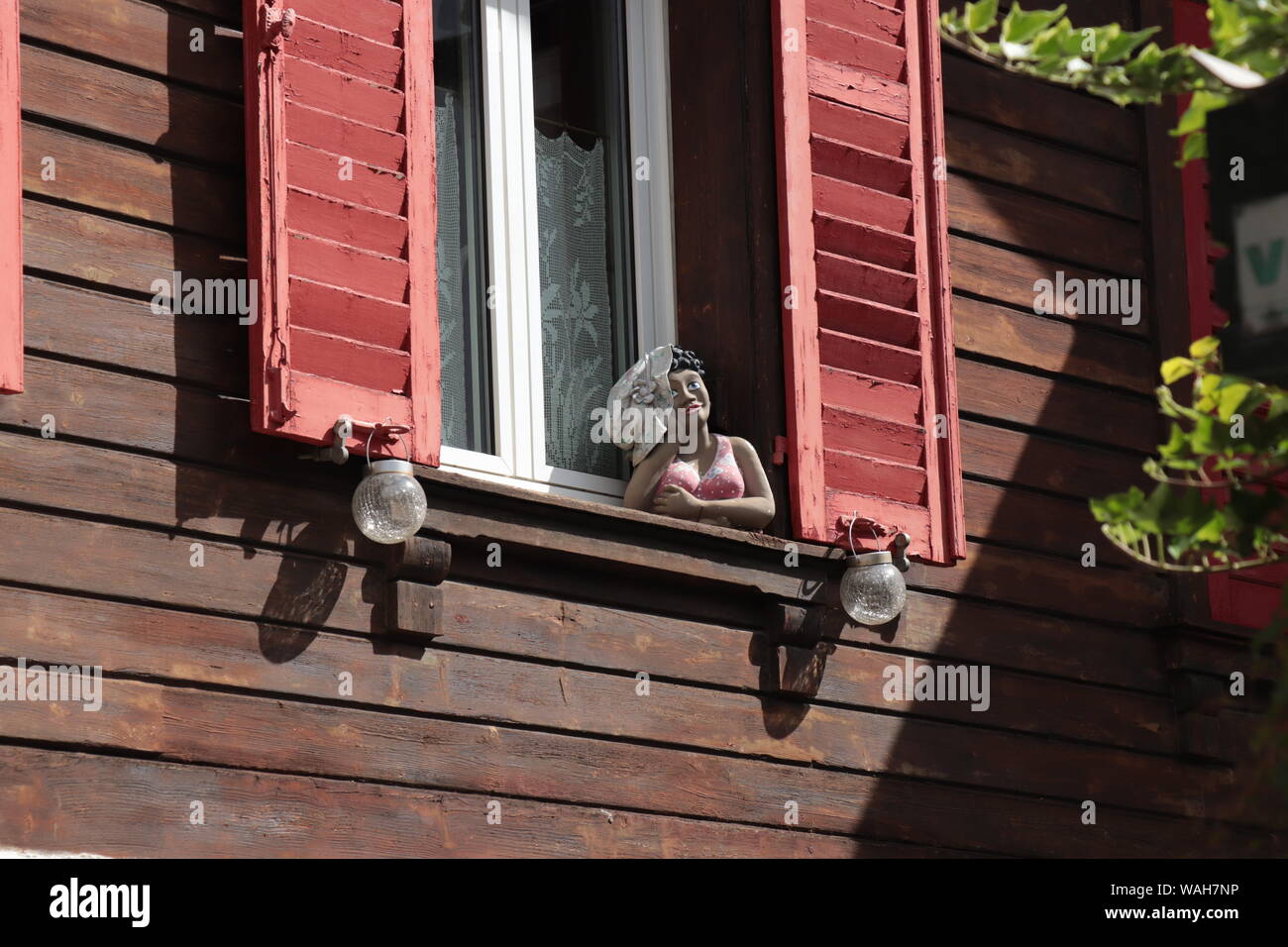 Lady at the window Stock Photo - Alamy