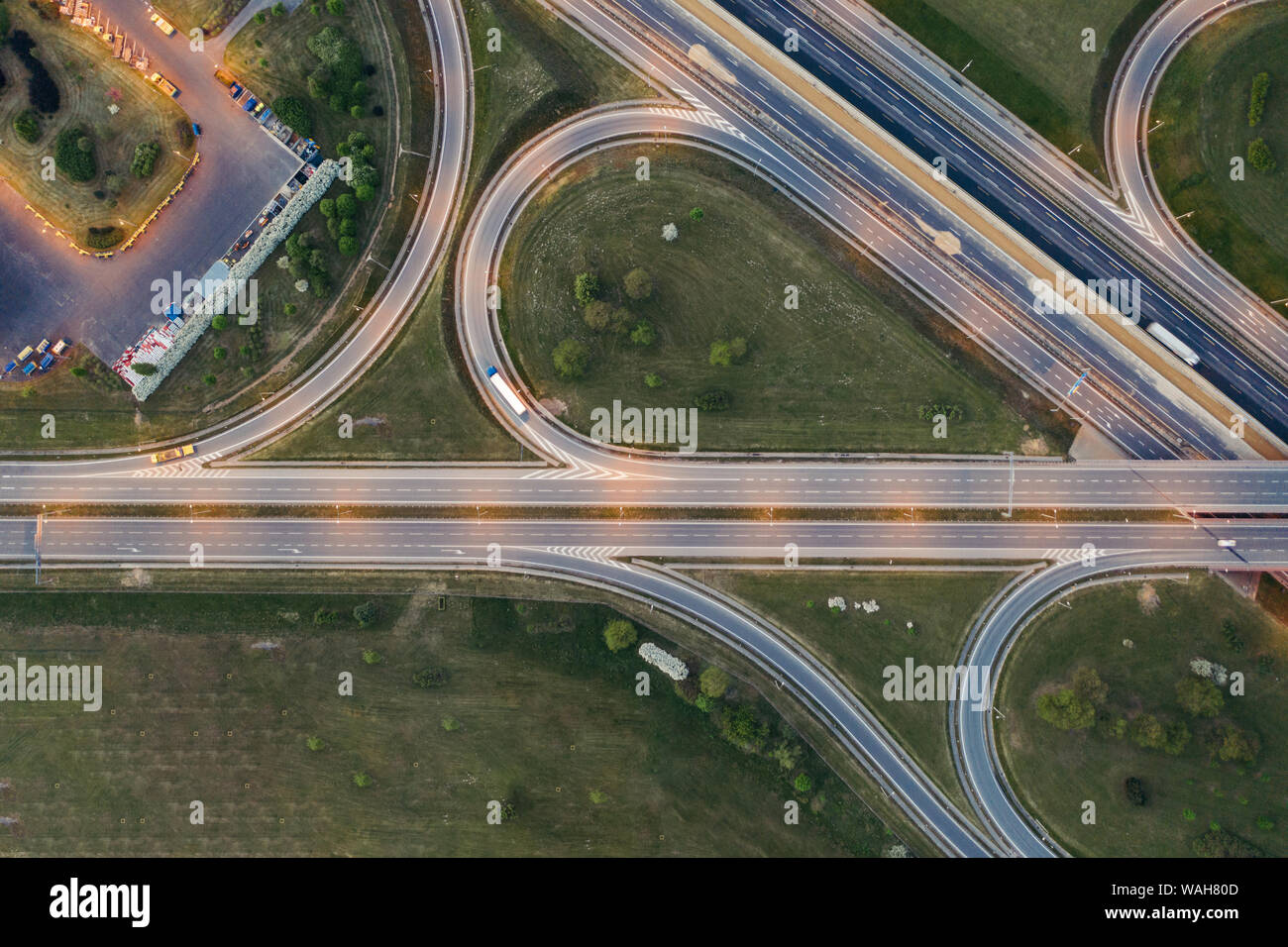 Aerial drone photography of the city suburbs, highway around the main ...