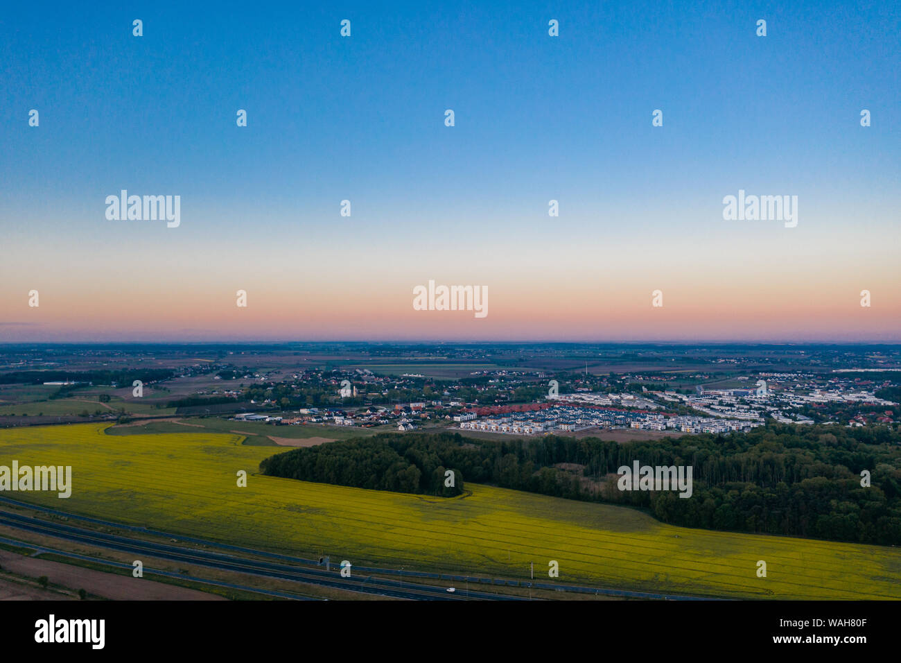 Aerial drone photography of the city suburbs, highway around the main ...