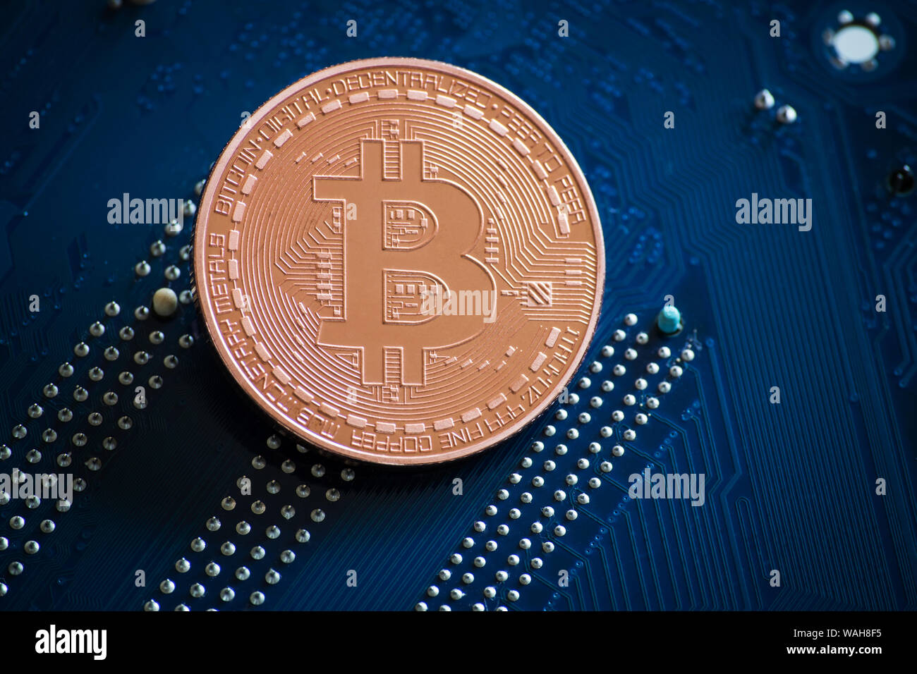 bitcoin symbol coin on computer part background. cryptocurrency ...