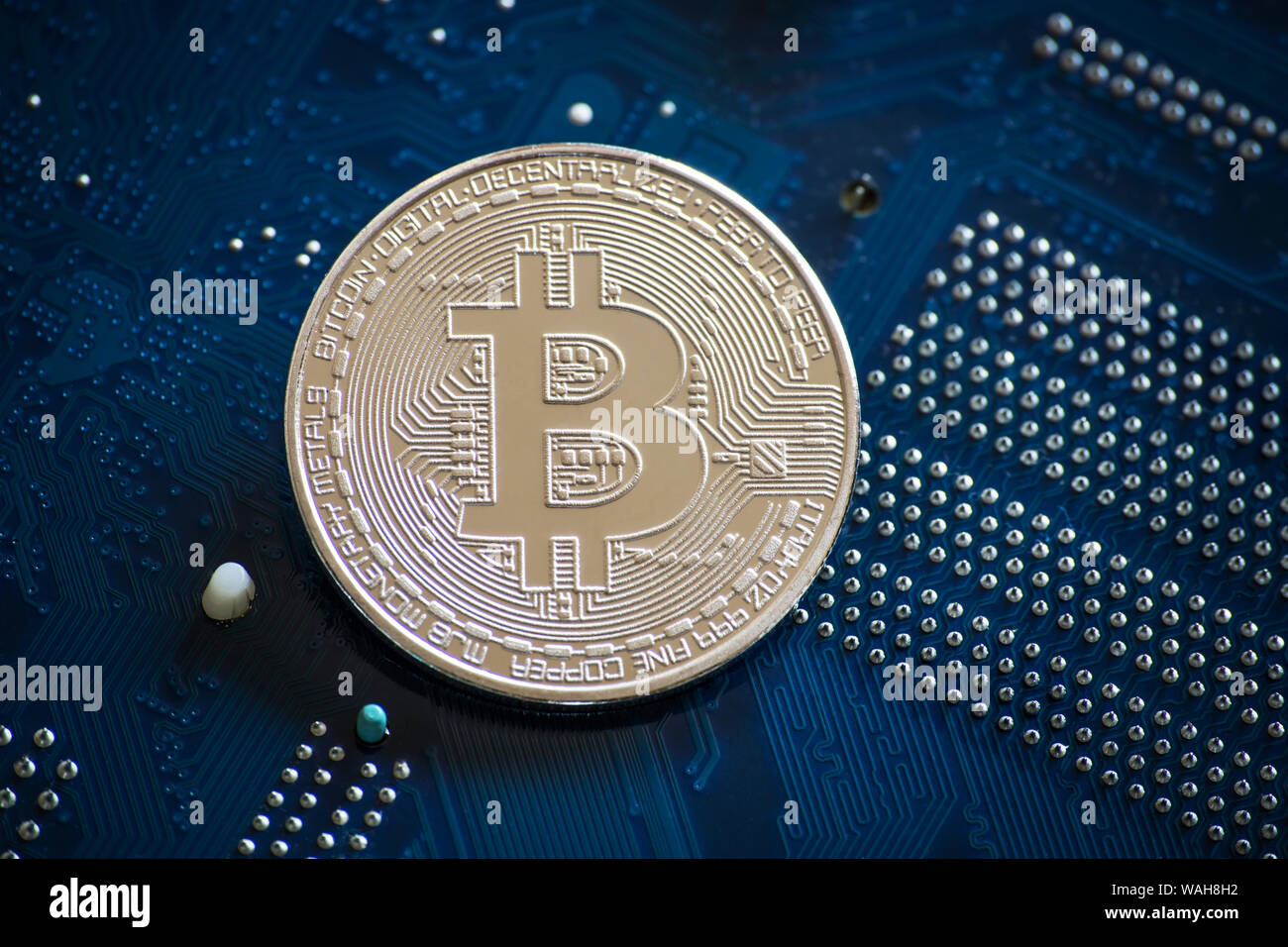 bitcoin symbol coin on computer part background. cryptocurrency ...