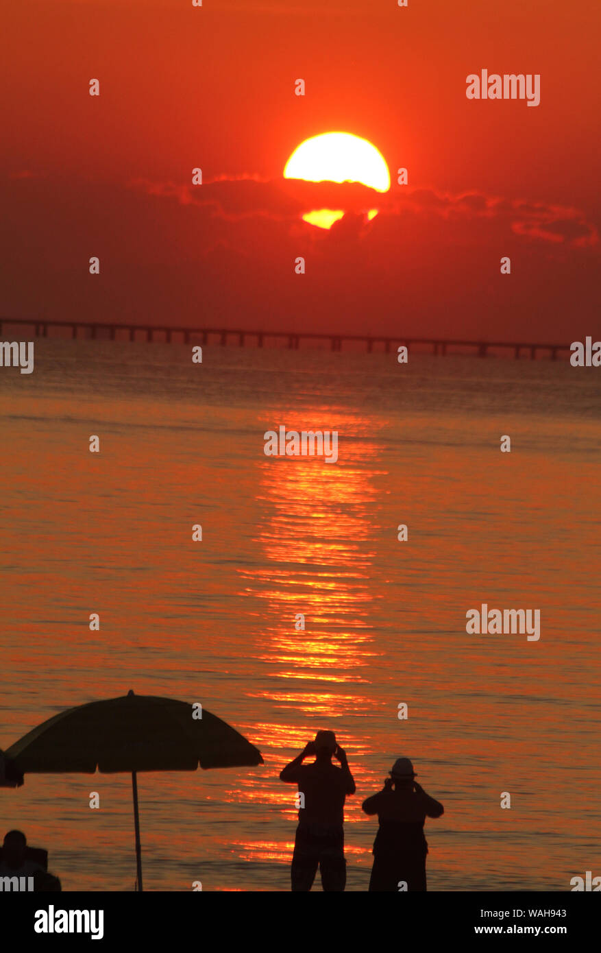 Virginia Beach, USA. Sunset with view of Chesapeake Bay Bridge–Tunnel ...