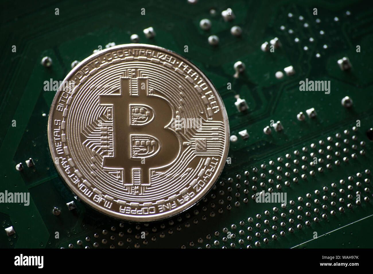 bitcoin symbol coin on computer part background. cryptocurrency ...