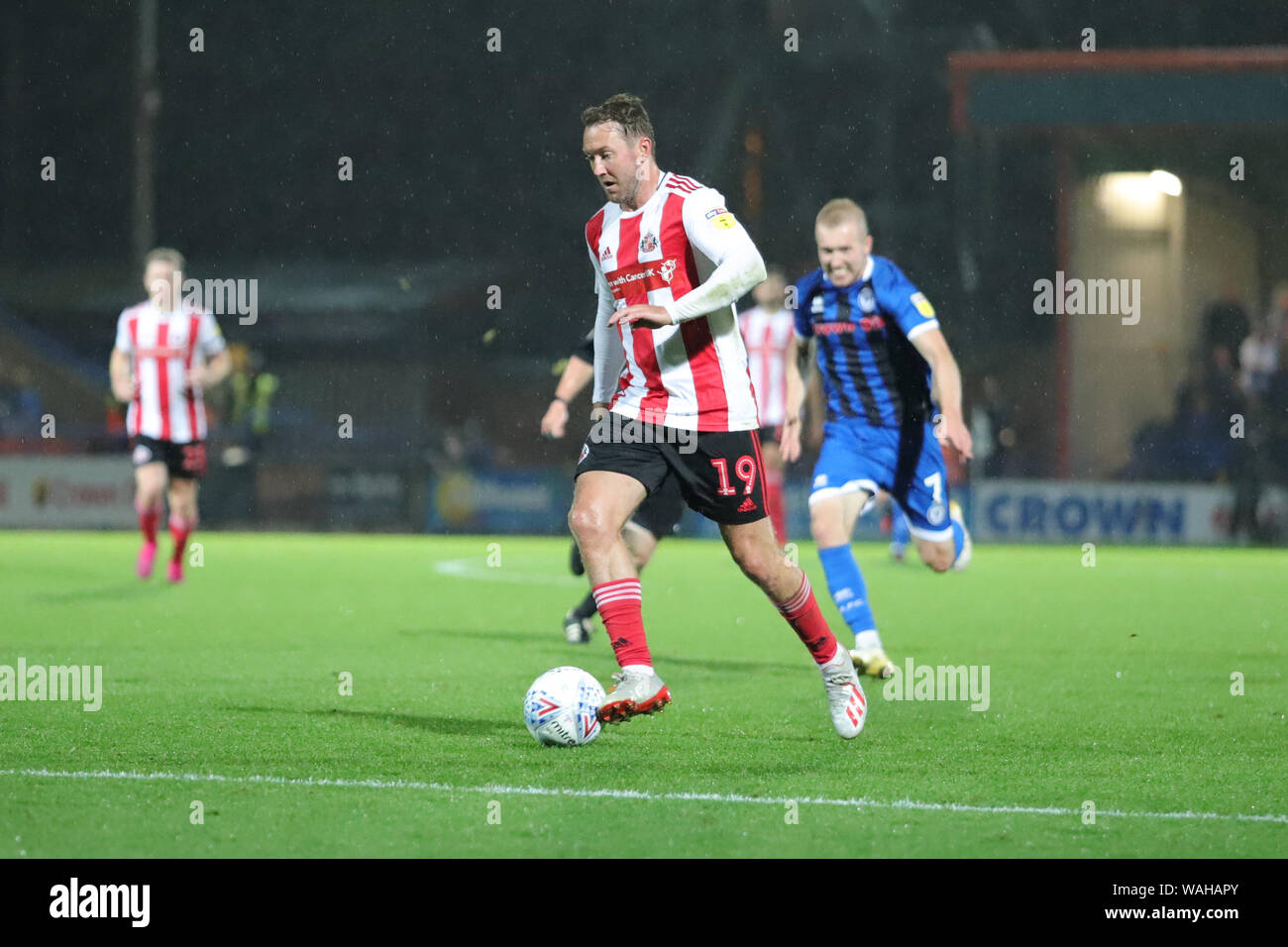 ROCHDALE, ENGLAND. AUG 20TH Aiden McGeady dribbles towards the Rochdale ...
