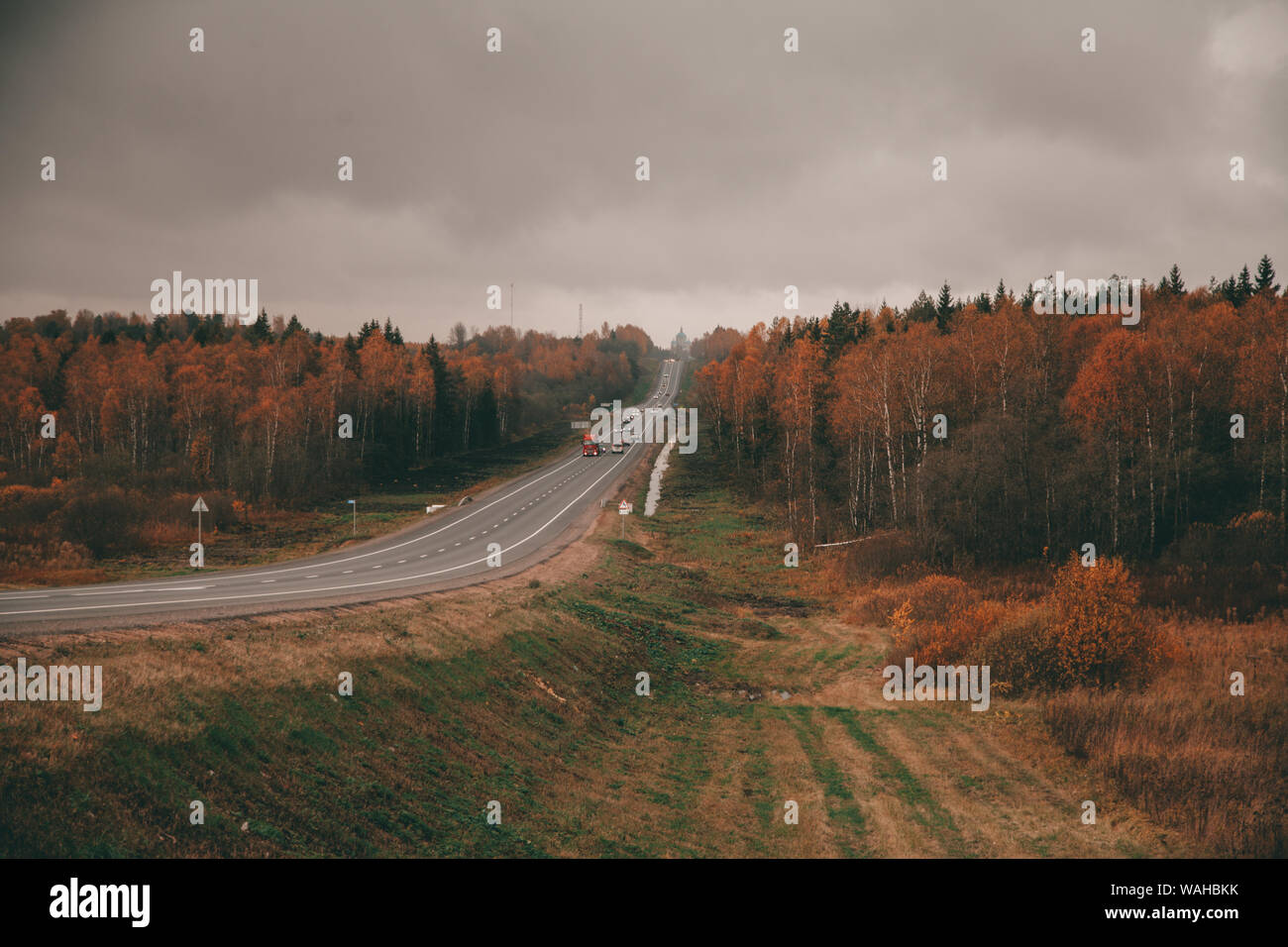 big empty road thru fall autumn trees with nobody Stock Photo - Alamy