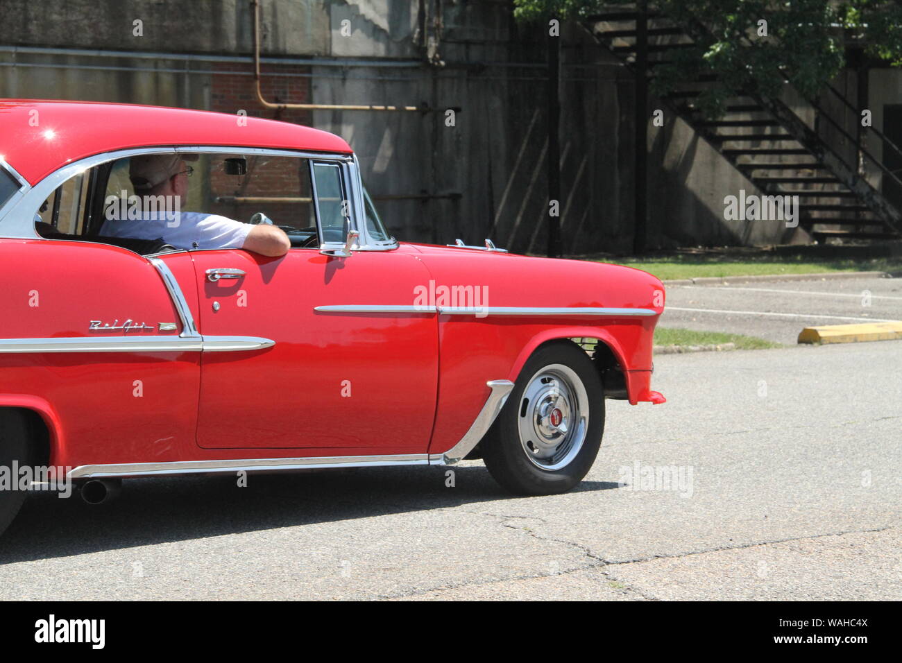Man driving a Chevrolet Bel Air vehicle Stock Photo - Alamy