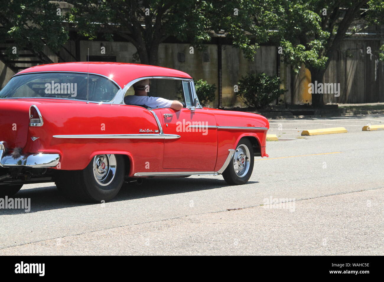 Man driving a Chevrolet Bel Air vehicle Stock Photo - Alamy